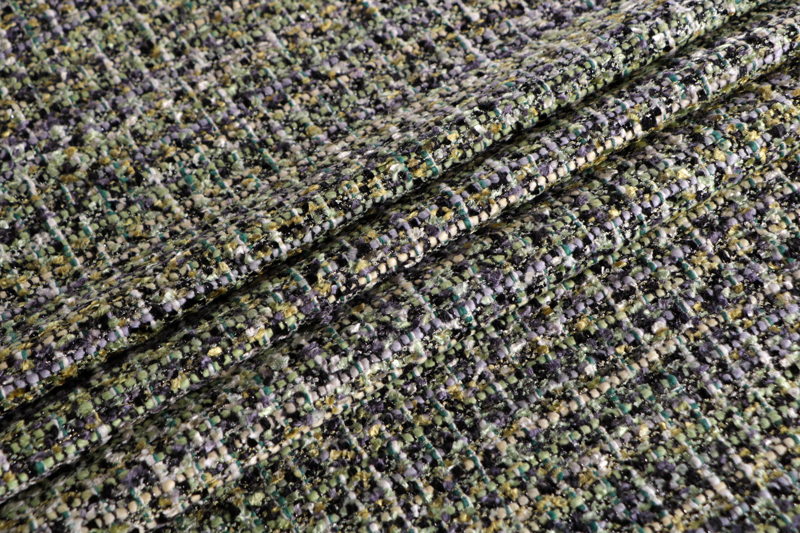 Bouclé and tweed fabrics for dressmaking and high fashion