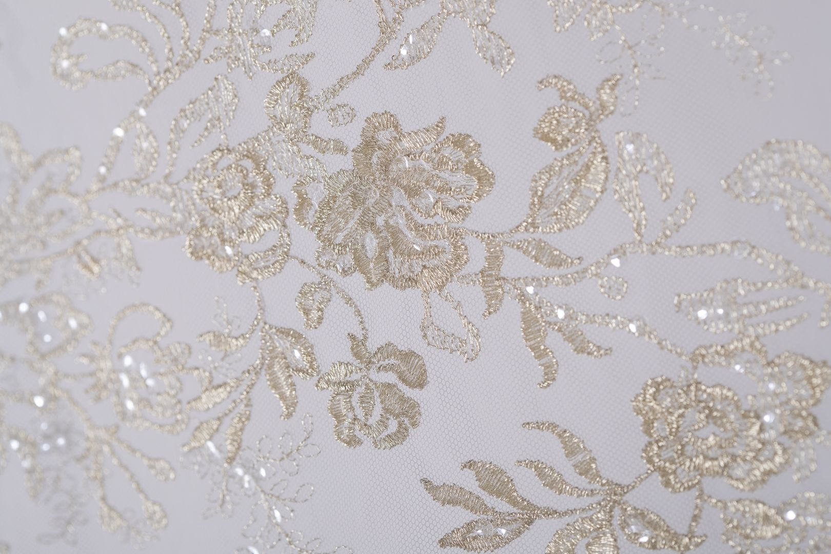 Luxurious gold embroidered tulle | new tess bridal fabrics