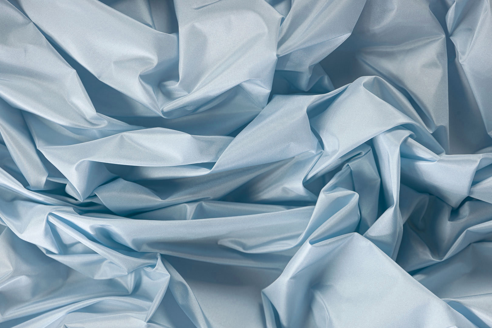 Light blue taffeta fabric in pure silk for dressmaking