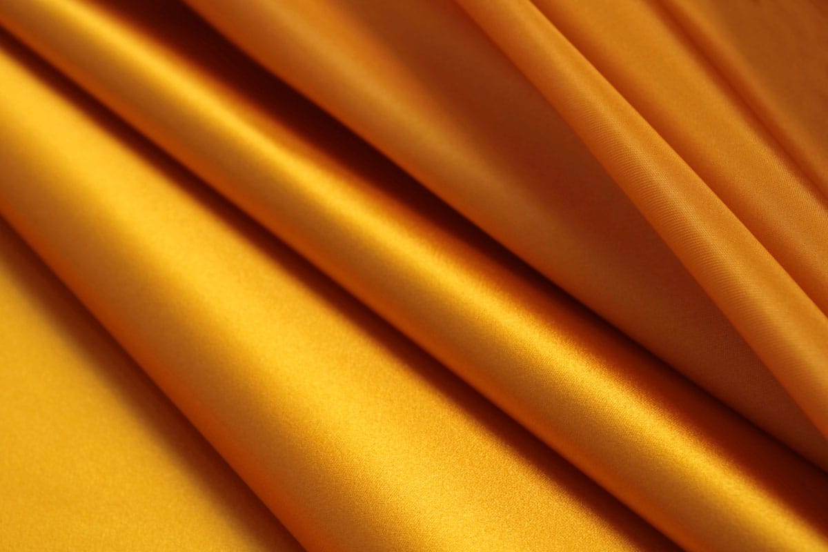 Premium quality orange fabrics for dressmaking | new tess